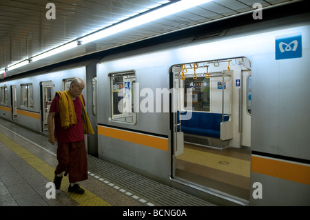 Monk in underground (subway) Tokyo, Japan Stock Photo - Alamy