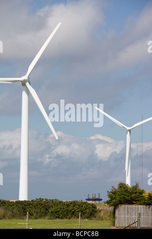 Wind turbines producing renewable electricity at a shopping centre on ...
