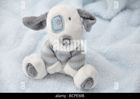 Cute baby toy dog blue Stock Photo - Alamy