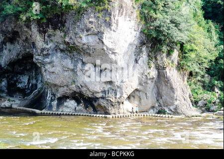Shallow water flow upon giant rock, Baishuiyang, Mandarin Duck Rive ...