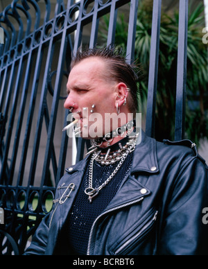 Young punk rocker smoking cigarette Stock Photo - Alamy