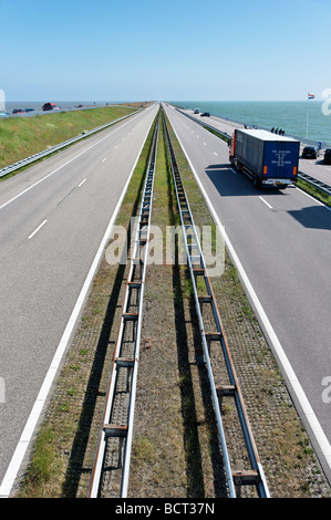 Motorway A7 on Afsluitdijk, a dam separating the North Sea from the ...