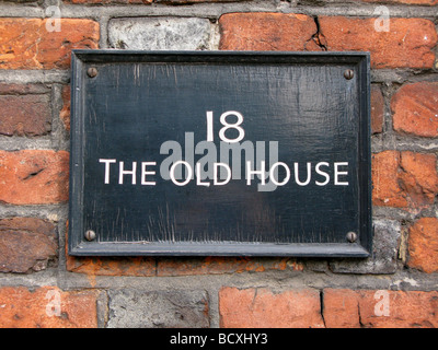 Old Weathered House Number 18, Tile on Wall Stock Photo - Alamy