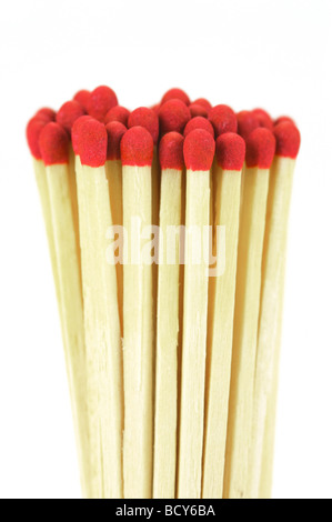 Red head matches isolated against a white background Stock Photo - Alamy