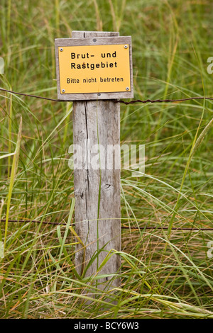 Warning sign indicating breeding area for endangered Piping Plovers at ...