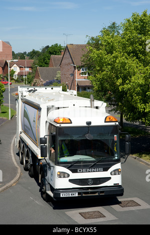 Dennis refuse lorry collecting rubbish and recycling waste on a ...