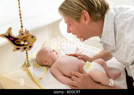 Changing babys nappy Stock Photo: 1684503 - Alamy