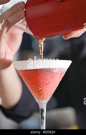 Bartender is pouring drink Stock Photo - Alamy