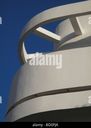 Protruding streamline balcony and a thin curved concrete shade of an ...