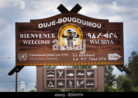 a sign welcomes travelers to the Ouje-Bougoumou Cree indian reserve in ...