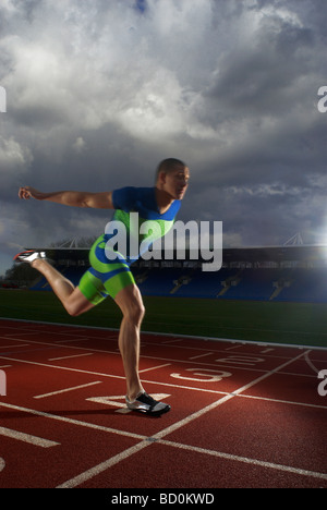 Runner reaching finish line Stock Photo - Alamy