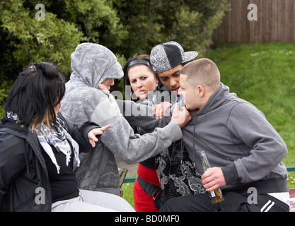 Group of people fighting Stock Photo - Alamy