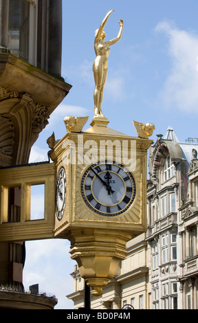 The Northern Goldsmiths golden clock and statue in the sunshine on ...