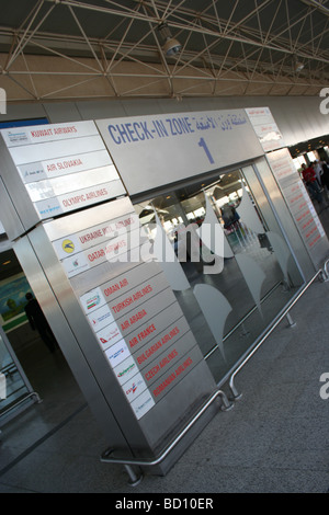 Kuwait City Airport Check In Zone airline sign Stock Photo - Alamy