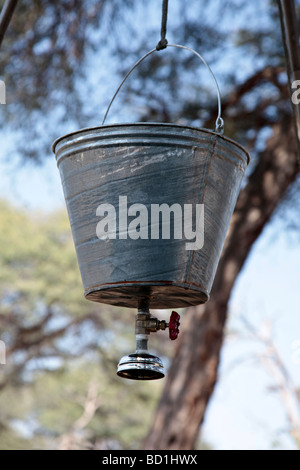Bucket shower used by tourists on luxury mobile tented safaris in ...