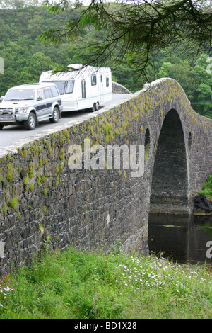 The Clachan Bridge links the island of Seil with mainland Scotland ...