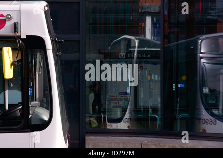 Bus with its own multiple reflections in Bus Station windows Stock ...