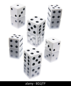 Stacks of game dice isolated on white background Stock Photo - Alamy