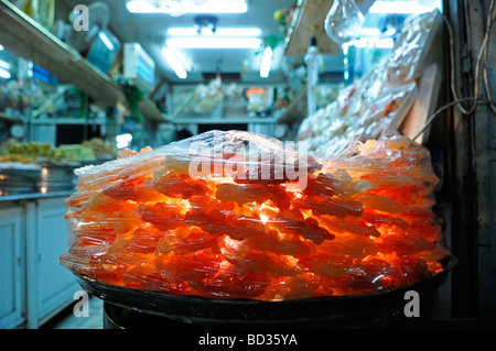 Pile of Mshabak or Mushabbak deep fried dough soaked in sweet syrup for ...