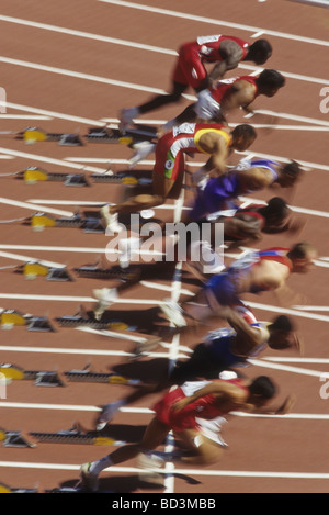Group of athletes sprinters run speed on track of stadium Stock Photo ...