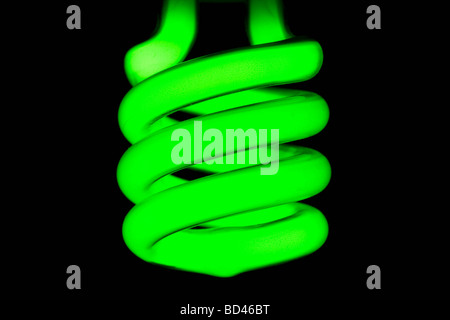 Close-up of a single green CFL (compact fluorescent lamp) light bulb in ...