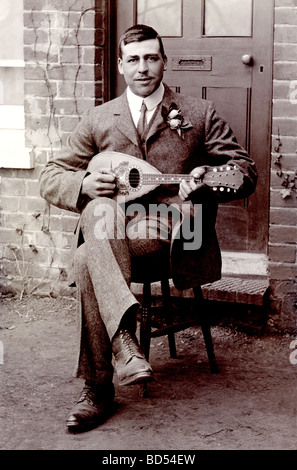 Man playing the lute Stock Photo - Alamy