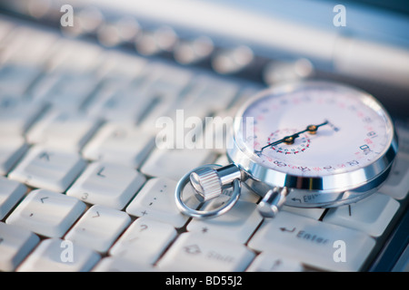 A compass on a computer keyboard Stock Photo - Alamy