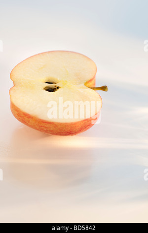 one and a half apples Stock Photo - Alamy