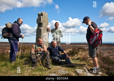 Walkers on the Lyke Wake Walk Lilla Cross Fylingdales Moor North ...