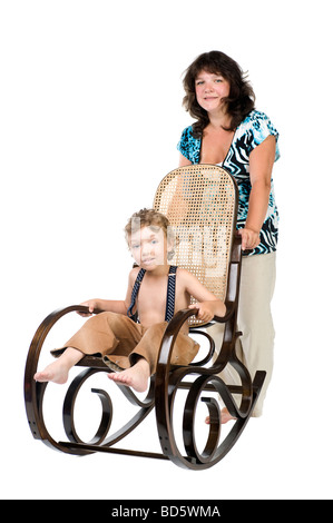 young boy rocking on a rocking chair Stock Photo - Alamy