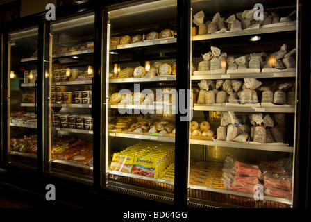 Upright freezer display case in small retail grocery store Stock Photo ...