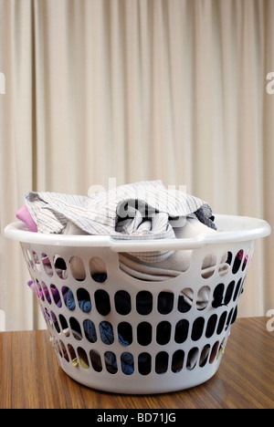 Laundry Basket with freshly washed clothes to dry Stock Photo - Alamy