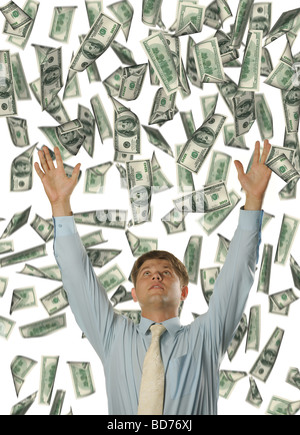 Falling dollars isolated Stock Photo - Alamy