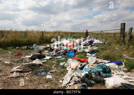 rubbish dumped in a field Stock Photo - Alamy