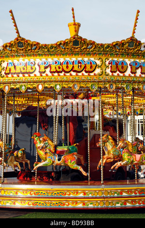 close up of merry-go-round seats, fairy carriage Stock Photo - Alamy