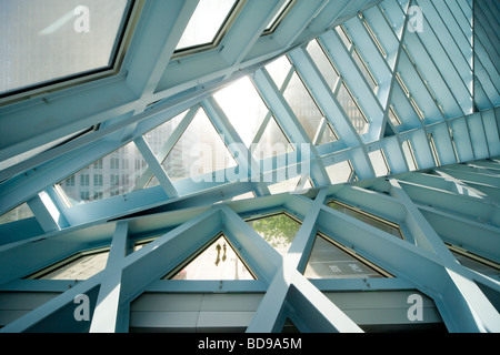 Interior view of Seattle Central Library with sloped glass roof ...