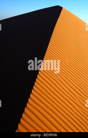 Sand dunes with sharp wind blown edge in the Namib desert, Namibia ...