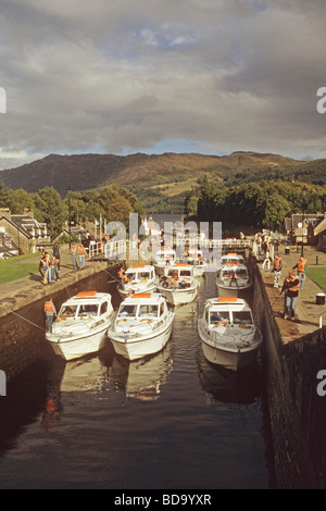 Inverness Scotland flotilla of boats in early summer sailing towards ...
