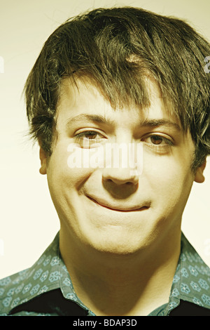 a young man making a face, portrait Stock Photo - Alamy