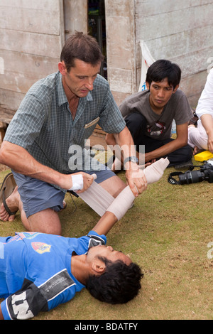 Sulawesi Lambusango forest reserve Graeme Gillespie demonstrating snake ...