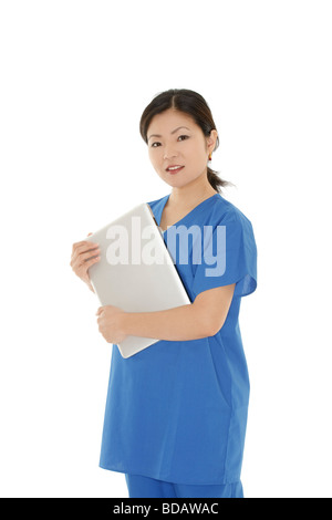 Asian adult women doctor holding VR headset virtual reality glasses ...