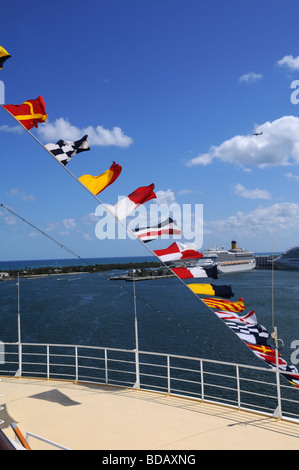 Colorful flags and cruise ship at the port of the summer palace of ...