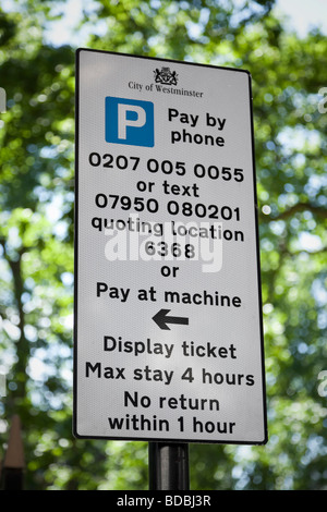 Pay by phone parking sign in the City of Westminster Council London UK ...