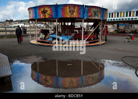 A roundabout on a run down fun fair site in the Scottish town of Stock ...