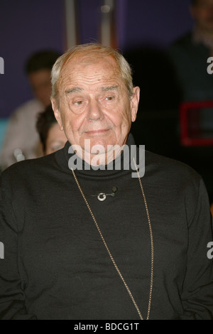 German actor Walter Giller in his role of circus clown Luggi, feeds ...