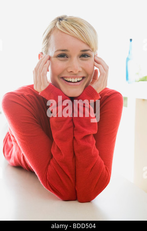 Woman lying on the floor in a relaxed posture Stock Photo - Alamy