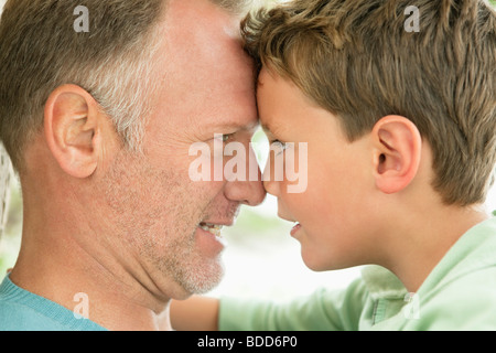Close-up of two boys rubbing noses Stock Photo - Alamy