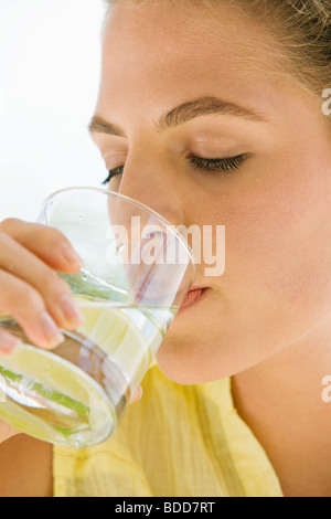 WOMAN DRINKING LEMONADE Stock Photo - Alamy