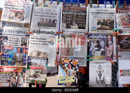 Spanish language newspapers tabloids and magazines at a newsstand in ...