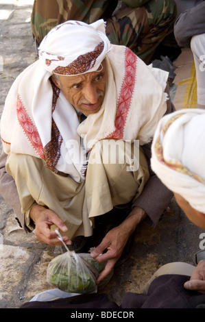 Man chewing Qat in the souk of Sana'a, a UNESCO World Heritage Site ...